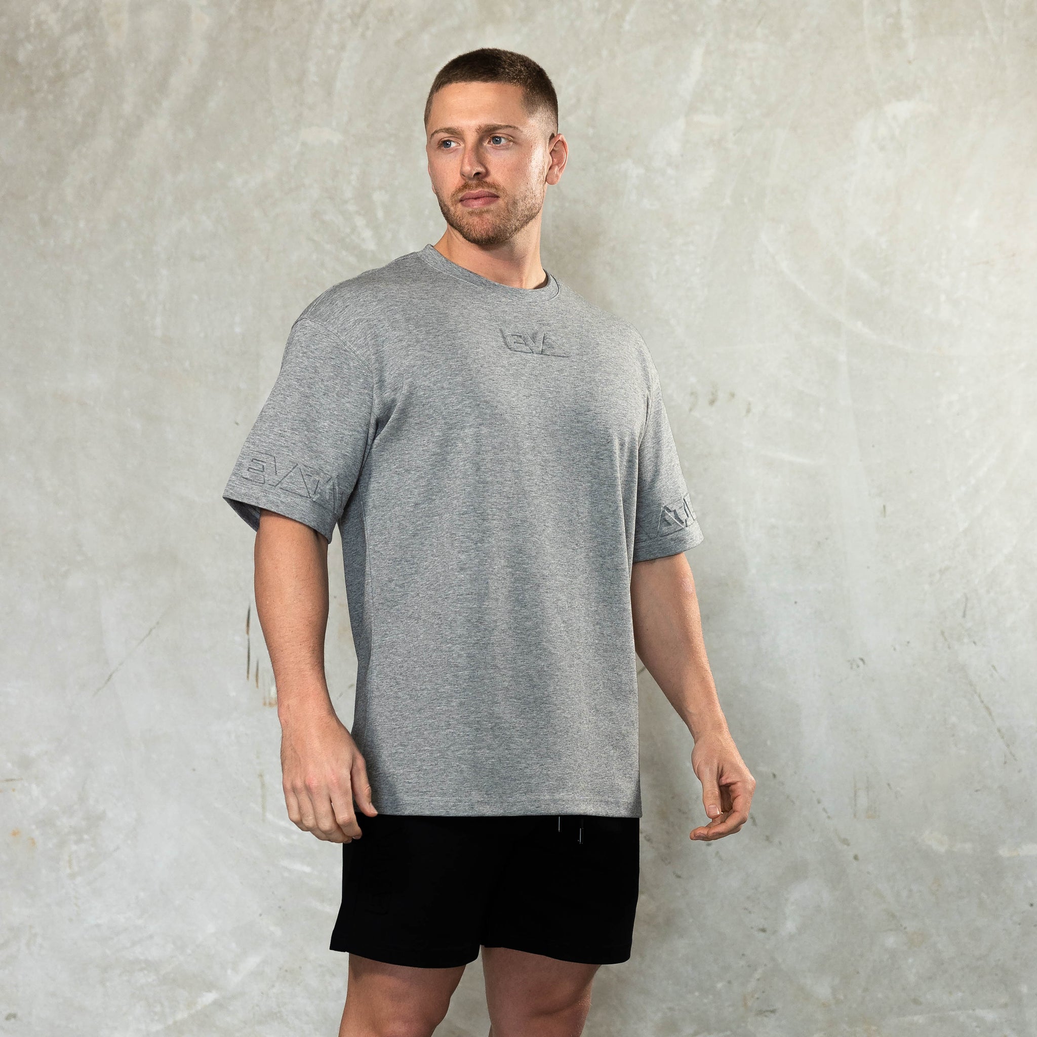 Embossed Tee [Black] | EVATAC